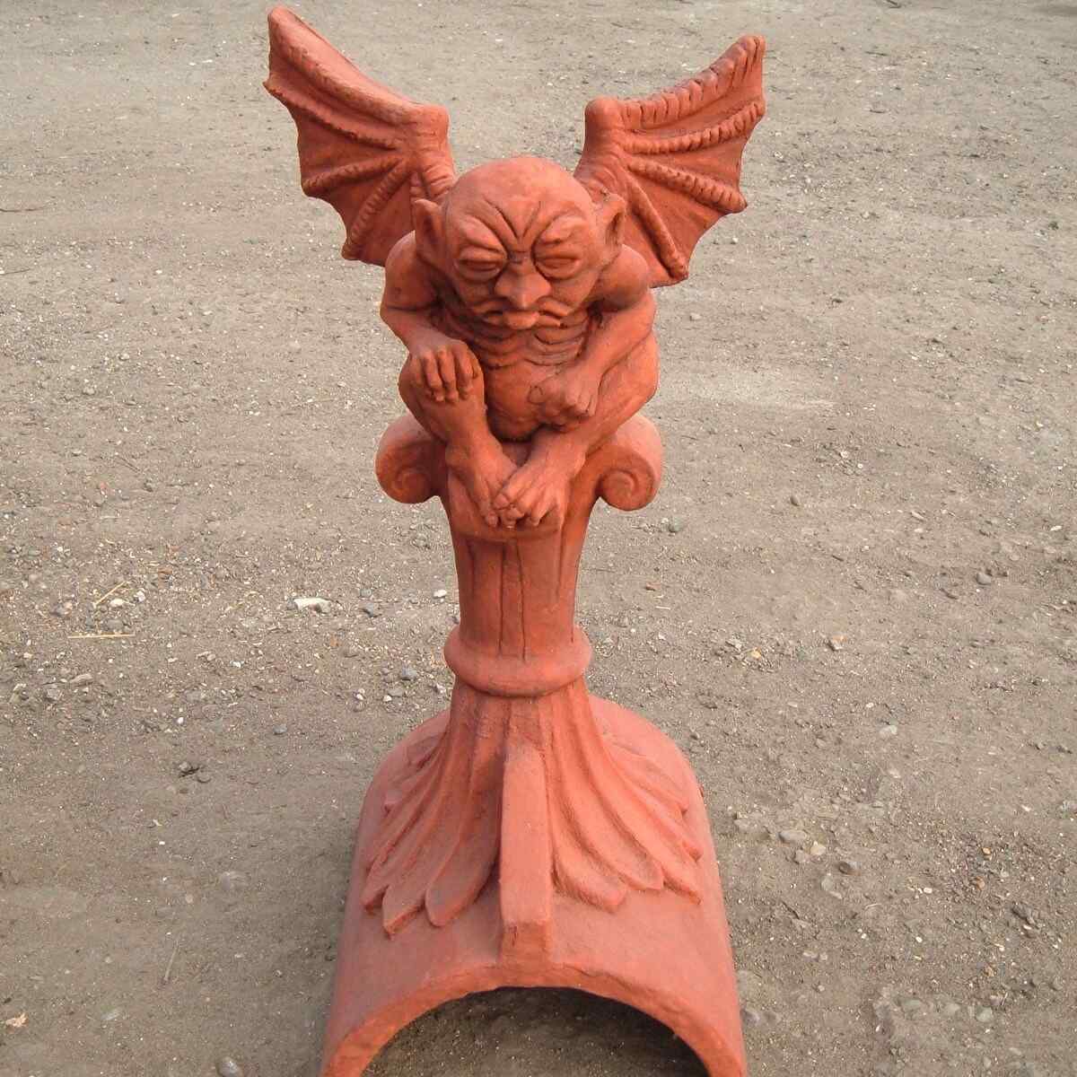 Gargoyles: Half round gargoyle roof finial